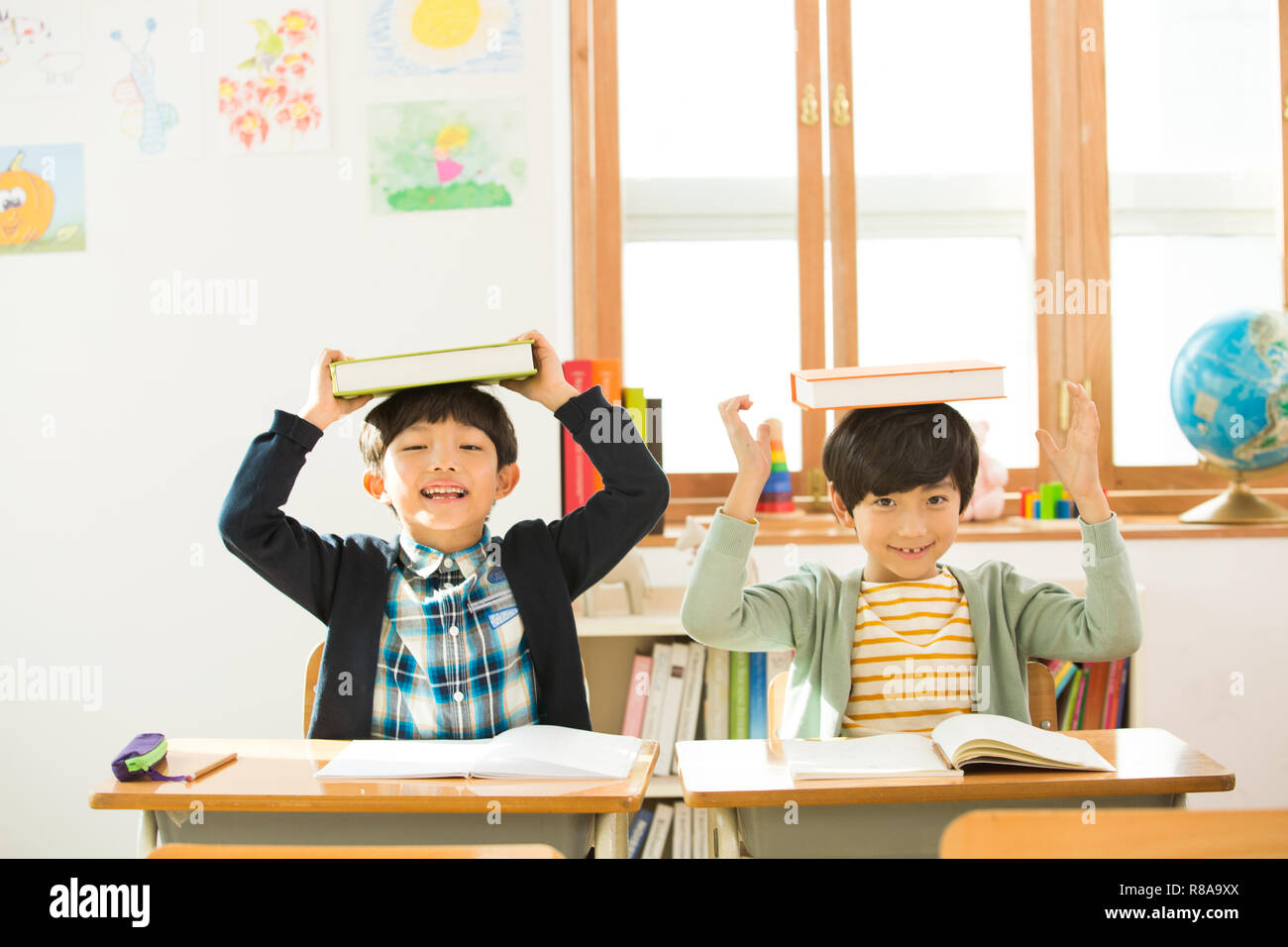 Two Young Female Students In Class Stock Photo - Alamy