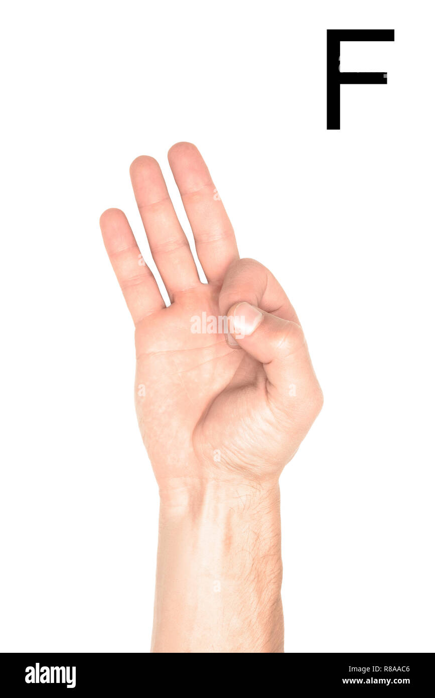 partial view of man showing latin letter - F, deaf and dumb language ...