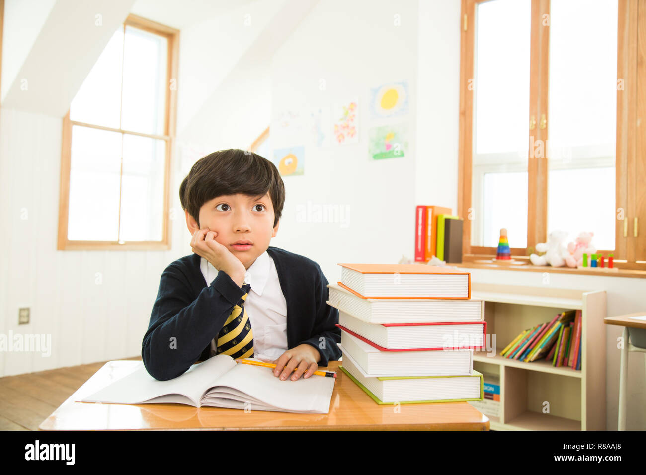 Young Student At The Desk Stock Photo - Alamy