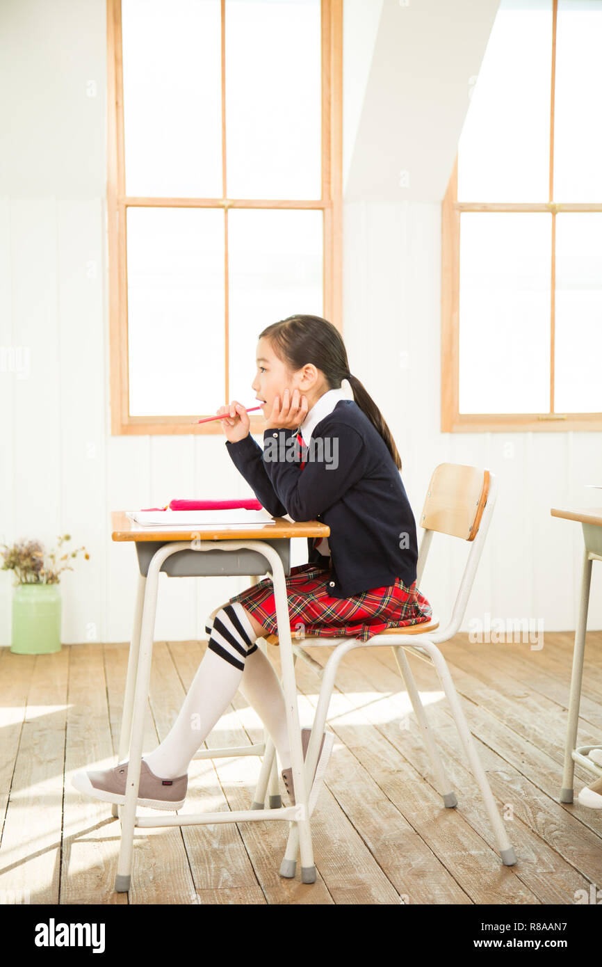 Young Student At The Desk Stock Photo - Alamy