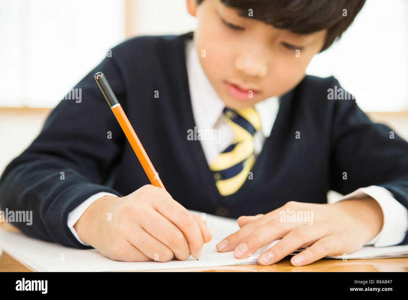 Young Student Studying In Class Stock Photo - Alamy