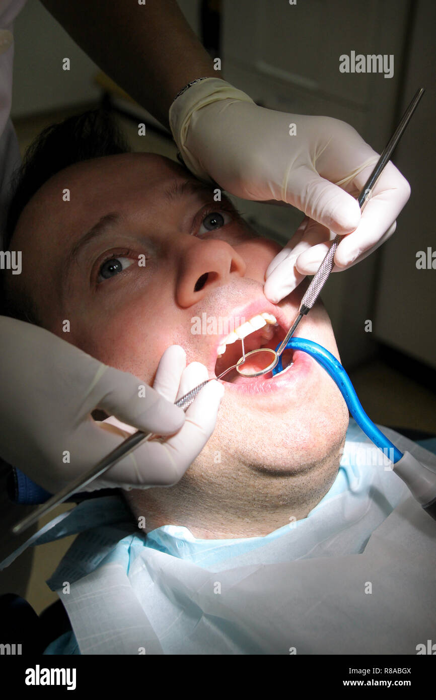 Dental check up. Dental checkup with dental tools probe, mirror and ...