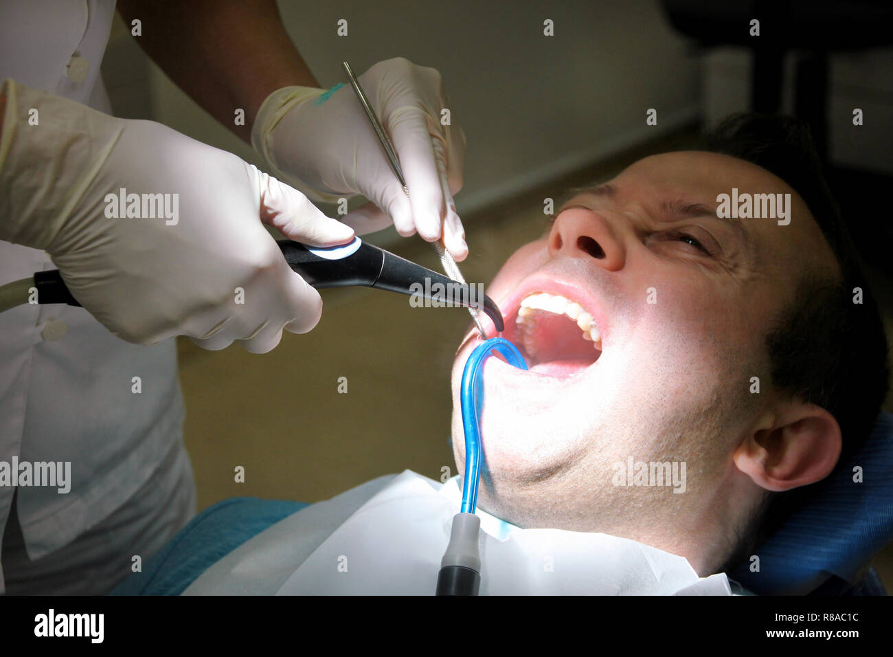 Dental tool for rinsing teeth. Teeth cleaning, dental hygiene. Dentist ...