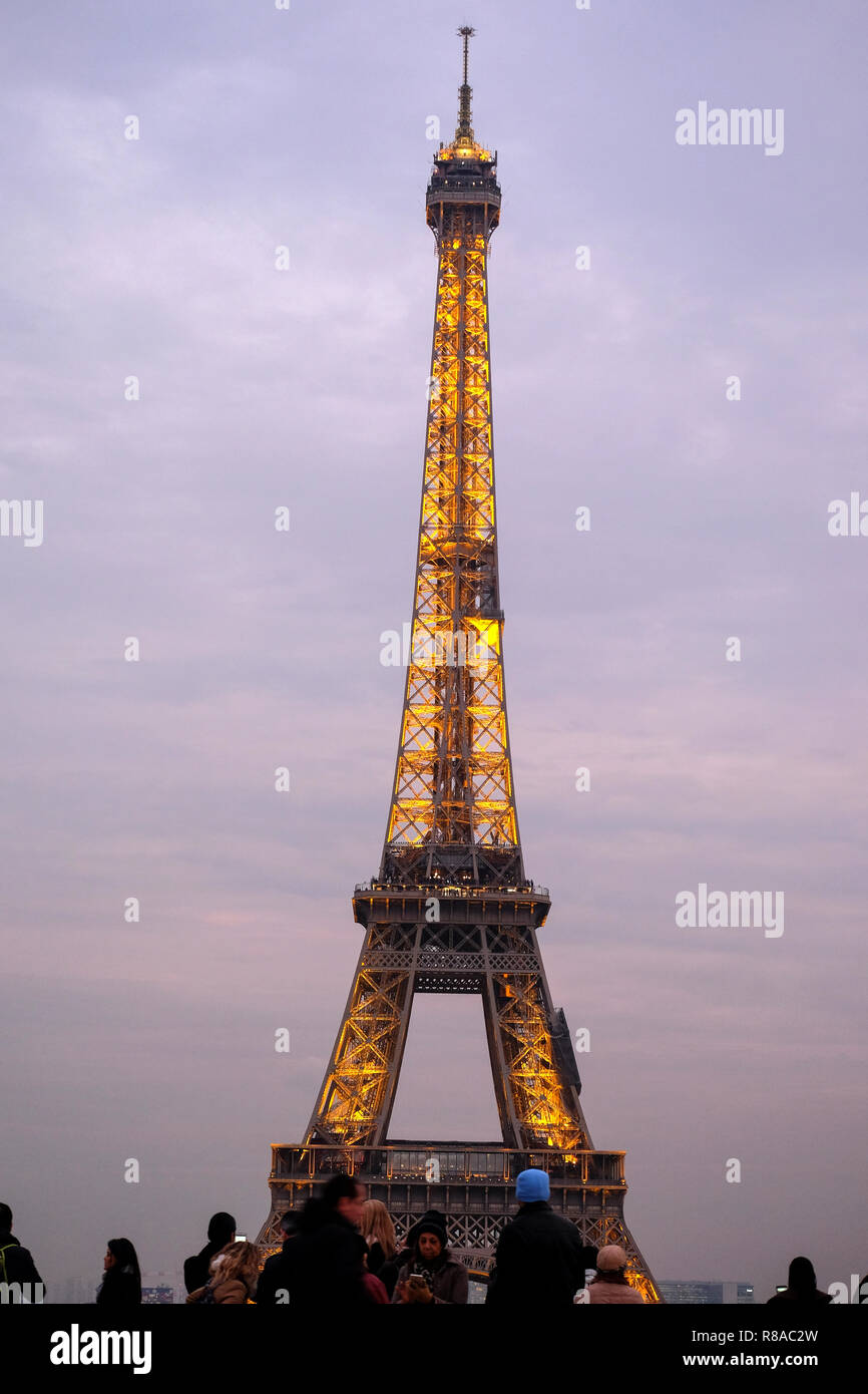 Paris, France - November 2017: Eiffel tower illuminated at dusk. The ...