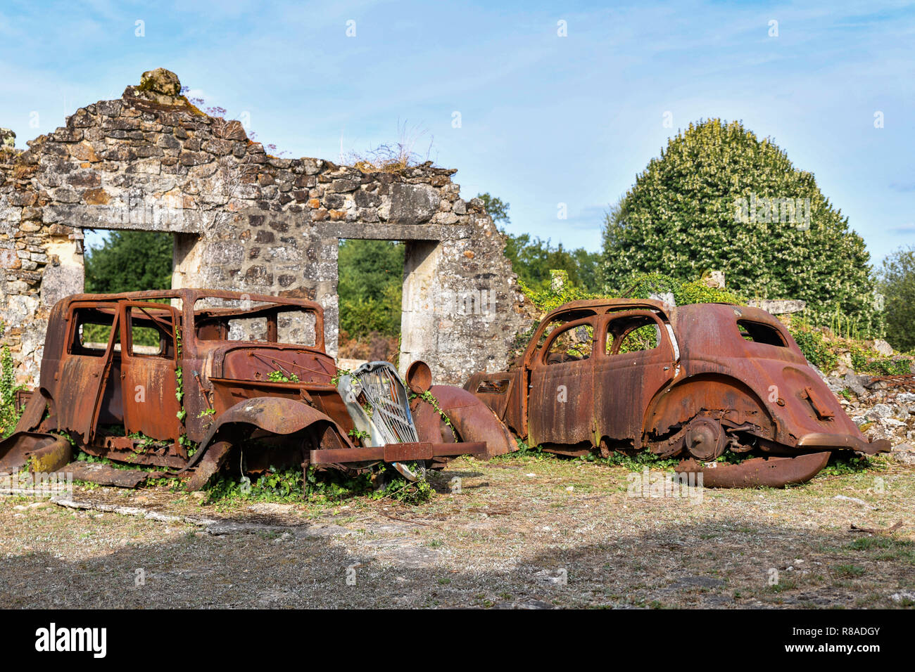 Destroyed cars during World War 2 in the city Oradour sur Glane France ...