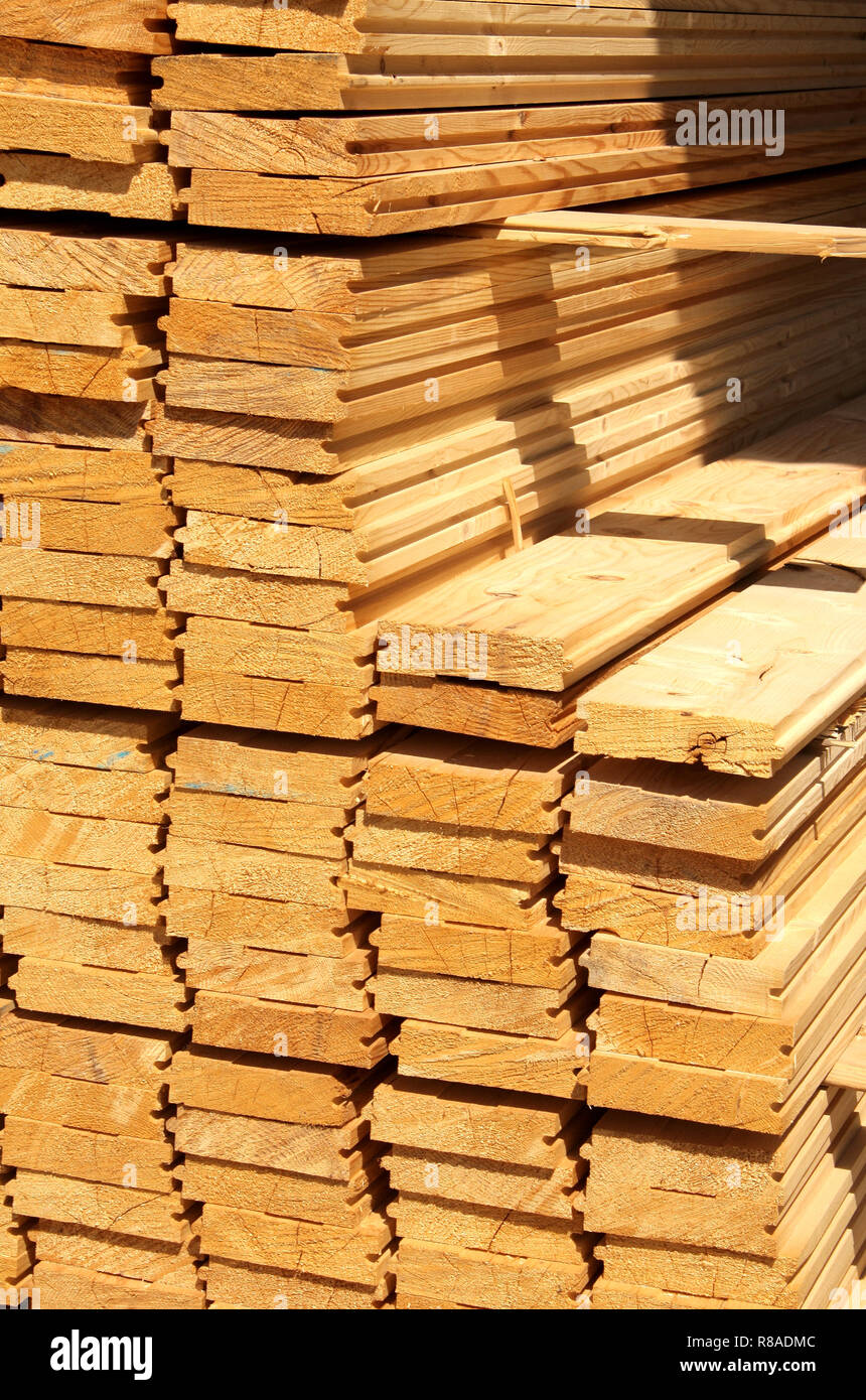 Wooden boards in a warehouse of building materials Stock Photo - Alamy