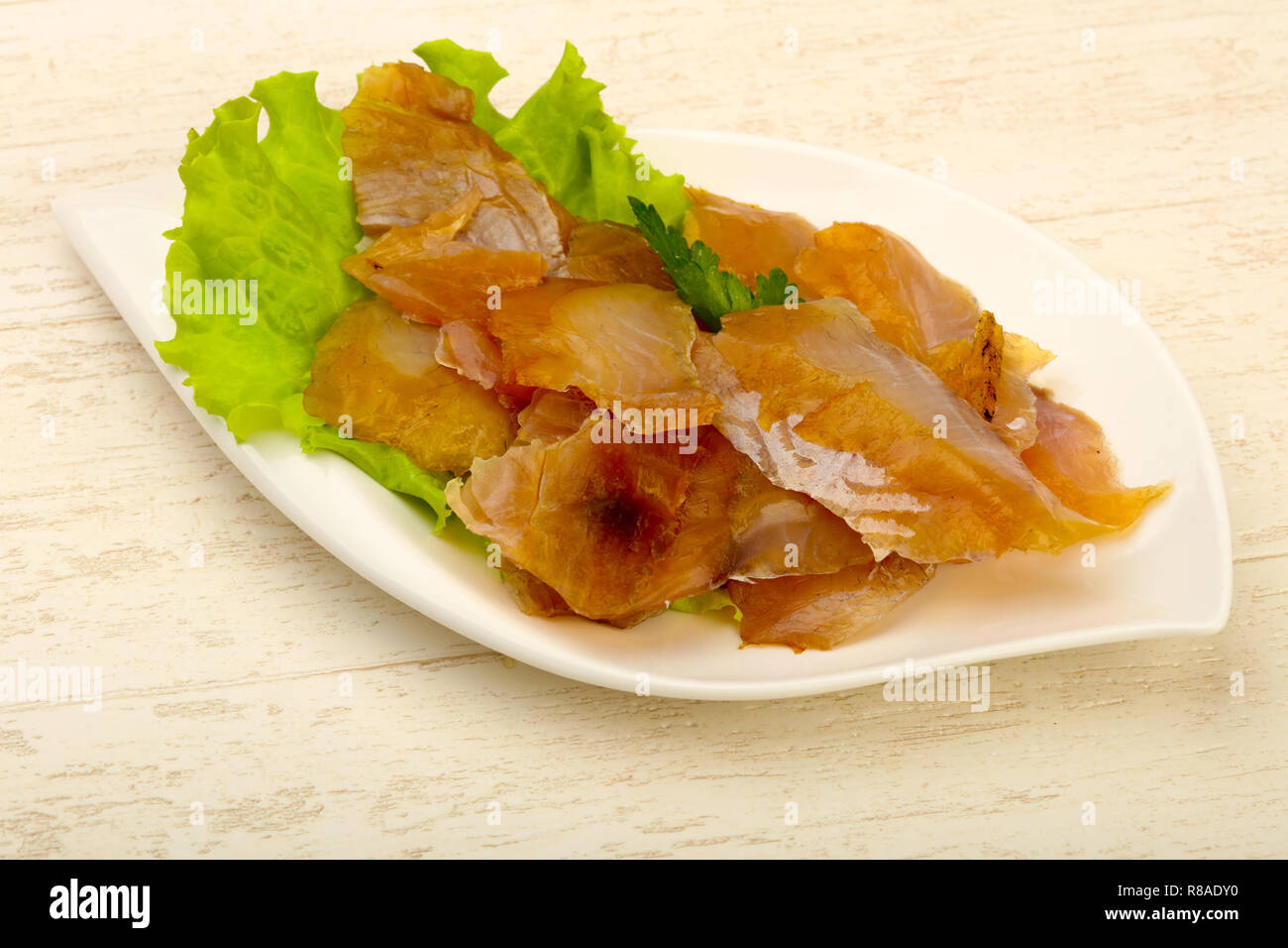 Smoked catfish fillet carpaccio Stock Photo - Alamy