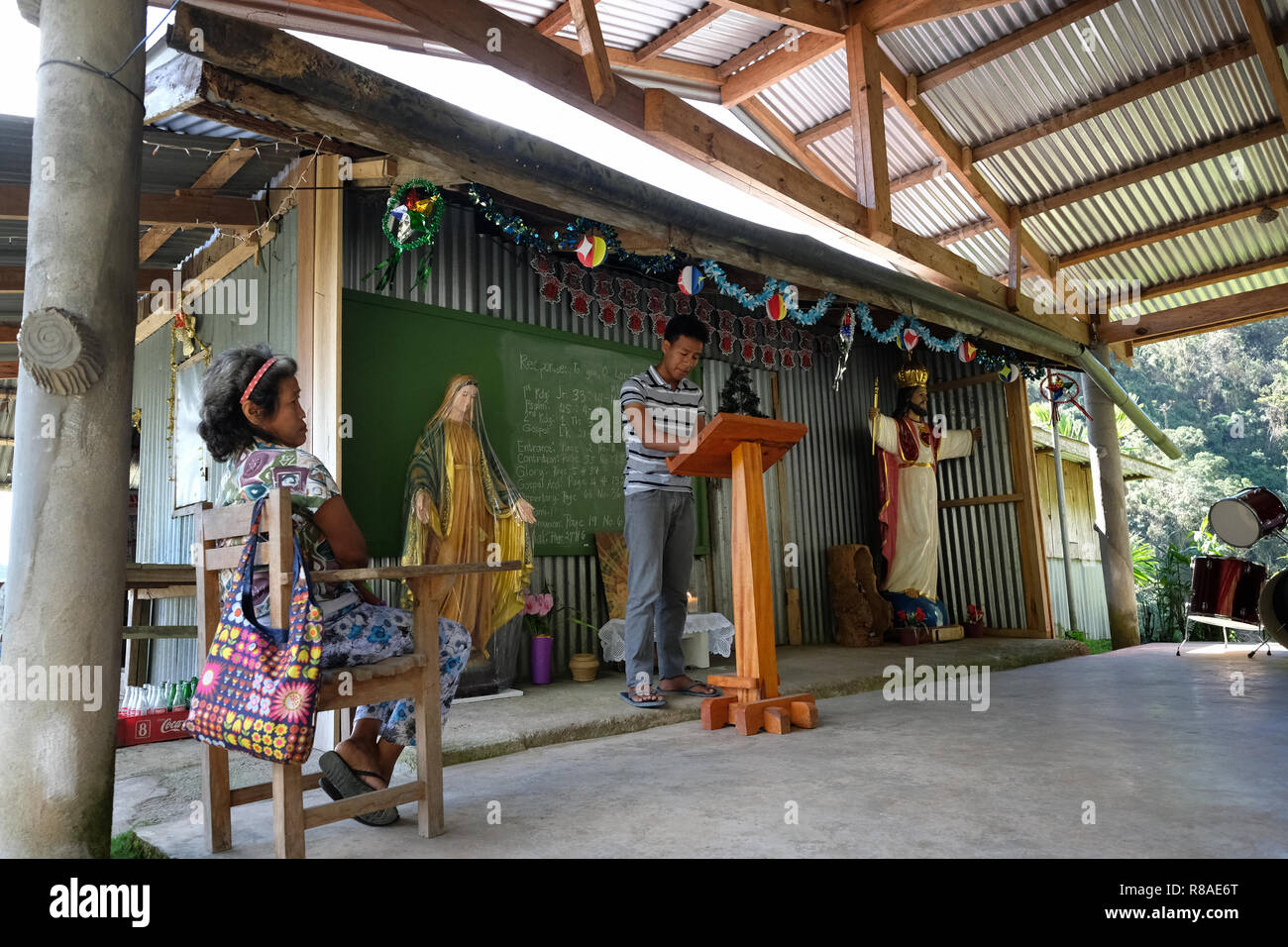 Members of Ifugao community attend a Sunday service at a small church ...