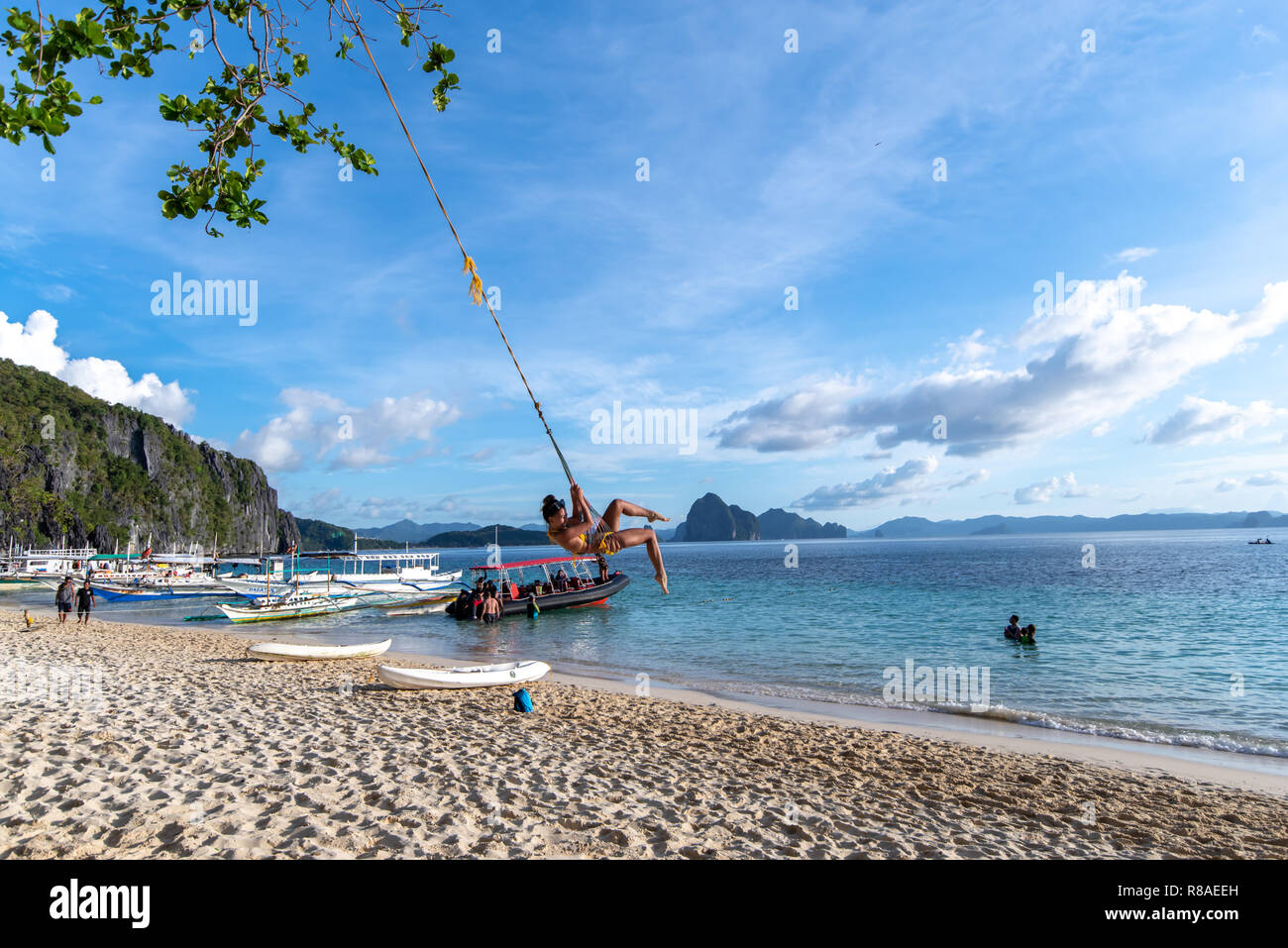 Nov 18,2018 A woman on a swing at the 7 commandos island beach in a El ...