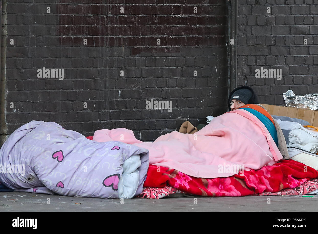 Homeless people sleeping under bridge hi-res stock photography and ...
