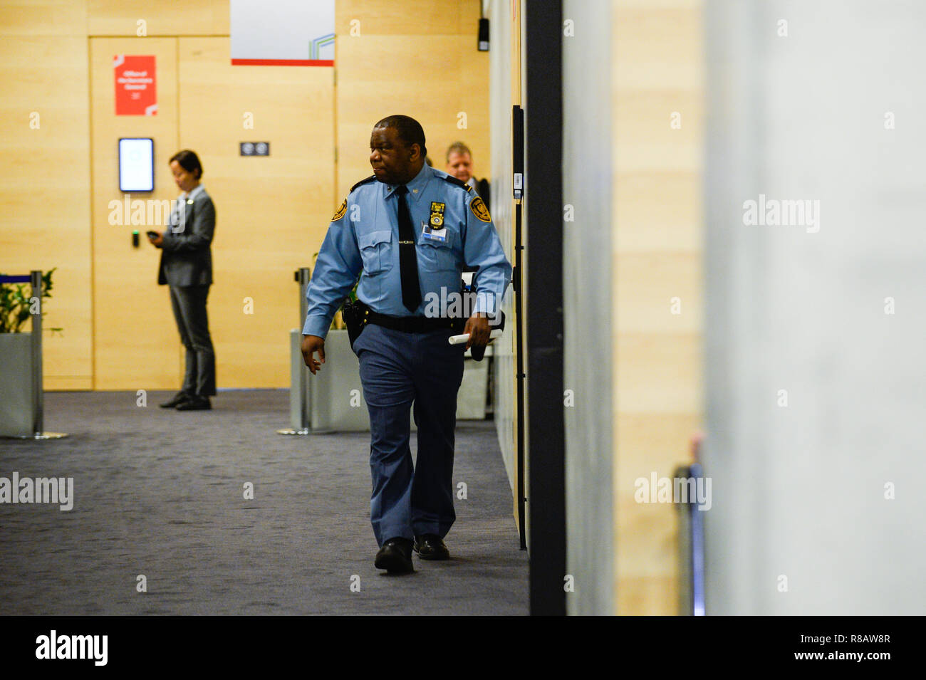 United Nations officer is seen taking security measures during the ...