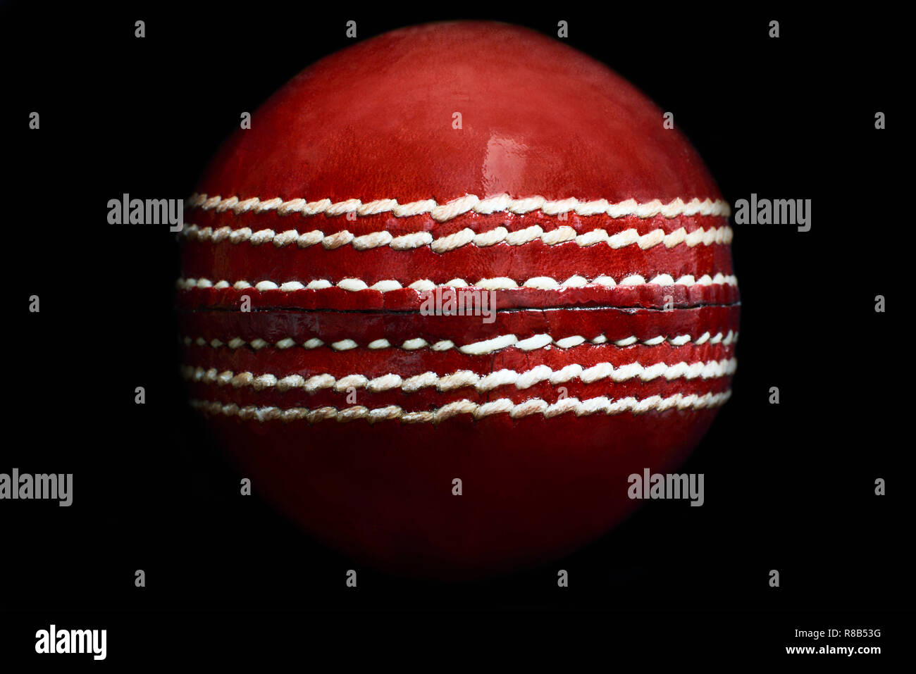 Close up of a leather cricket ball showing the seam Stock Photo - Alamy