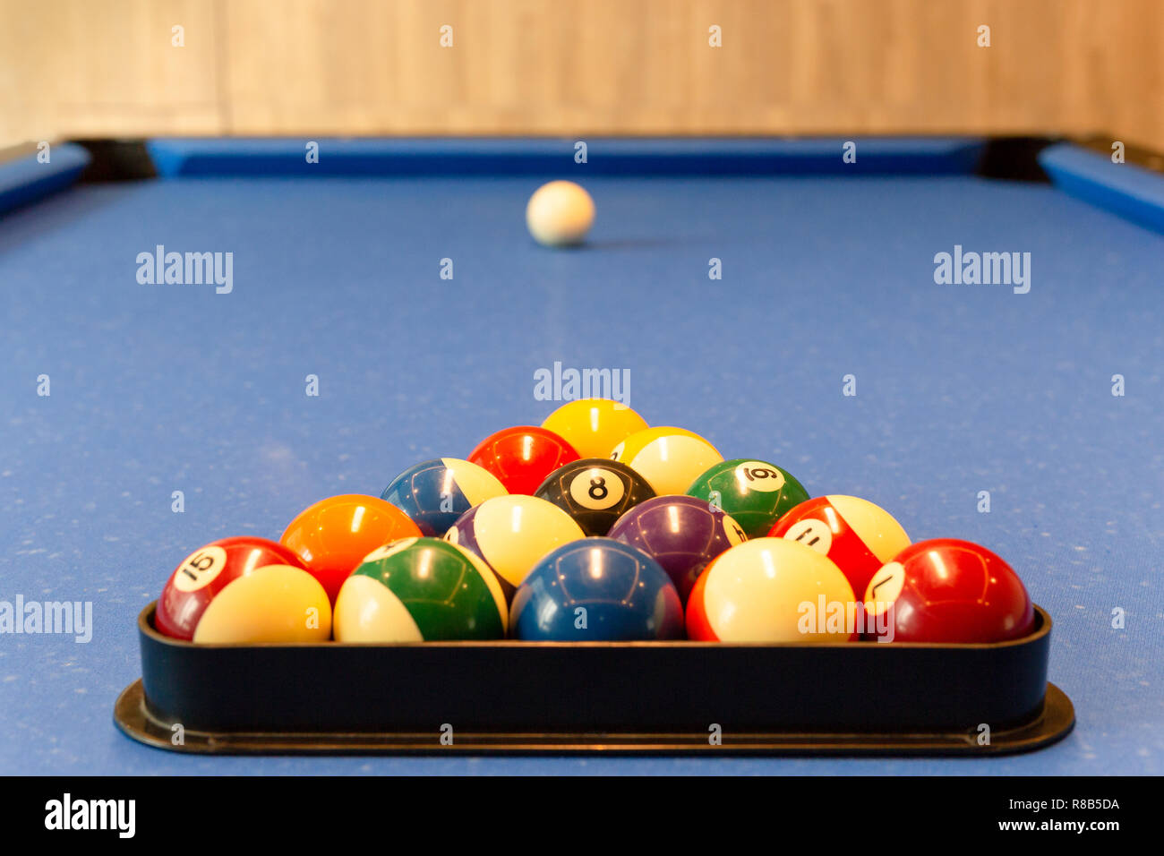Multi colored billiard balls with numbers lie in a triangle pyramid on ...