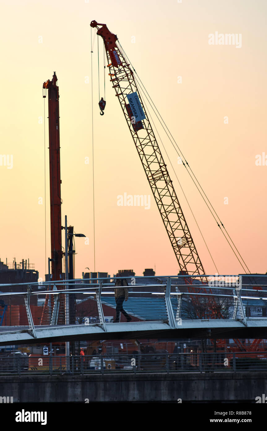 Glasgow, UK: 21 November 2018: People commute to work with the ...