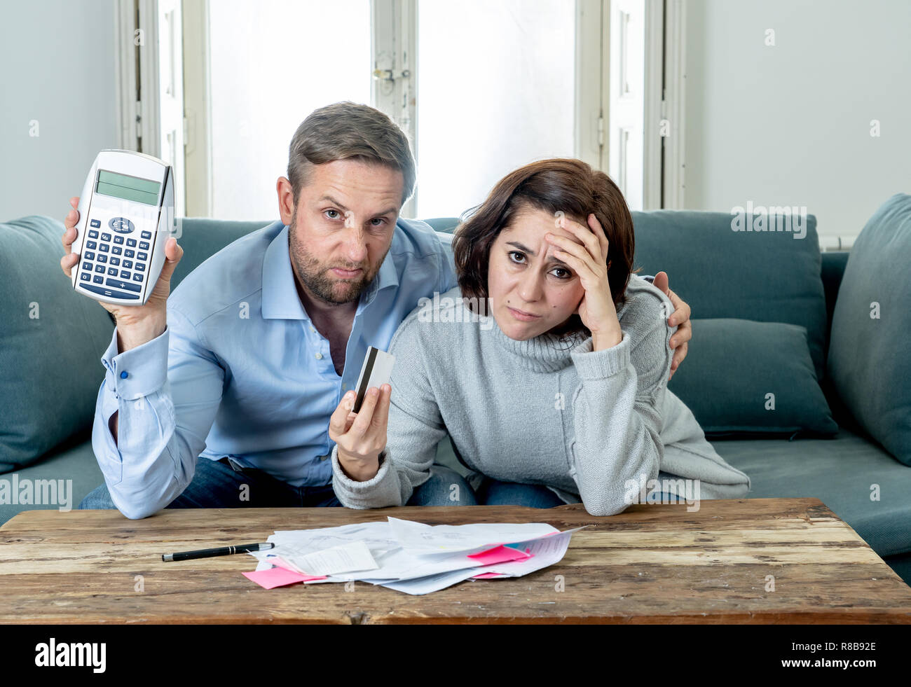 Husband and wife paying bills stressed hi-res stock photography and ...