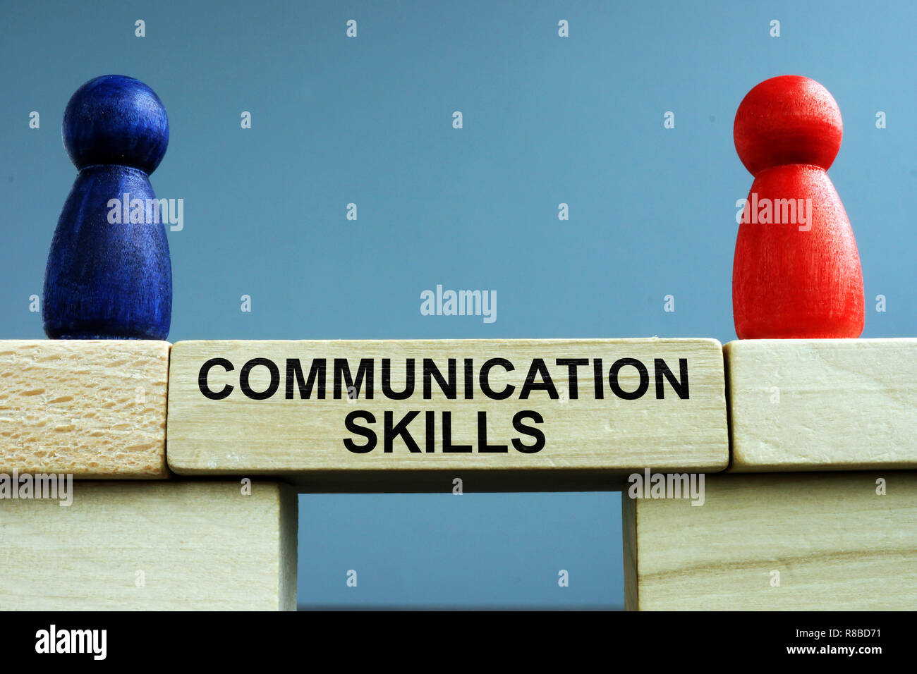 Communication skills written on a bridge from blocks Stock Photo - Alamy