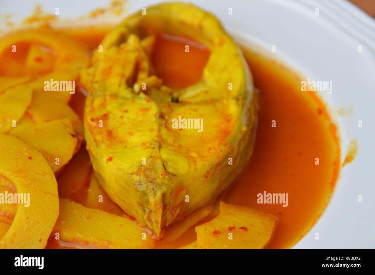 boiled red mango fish with pickled bamboo shoot in spicy and sour soup ...