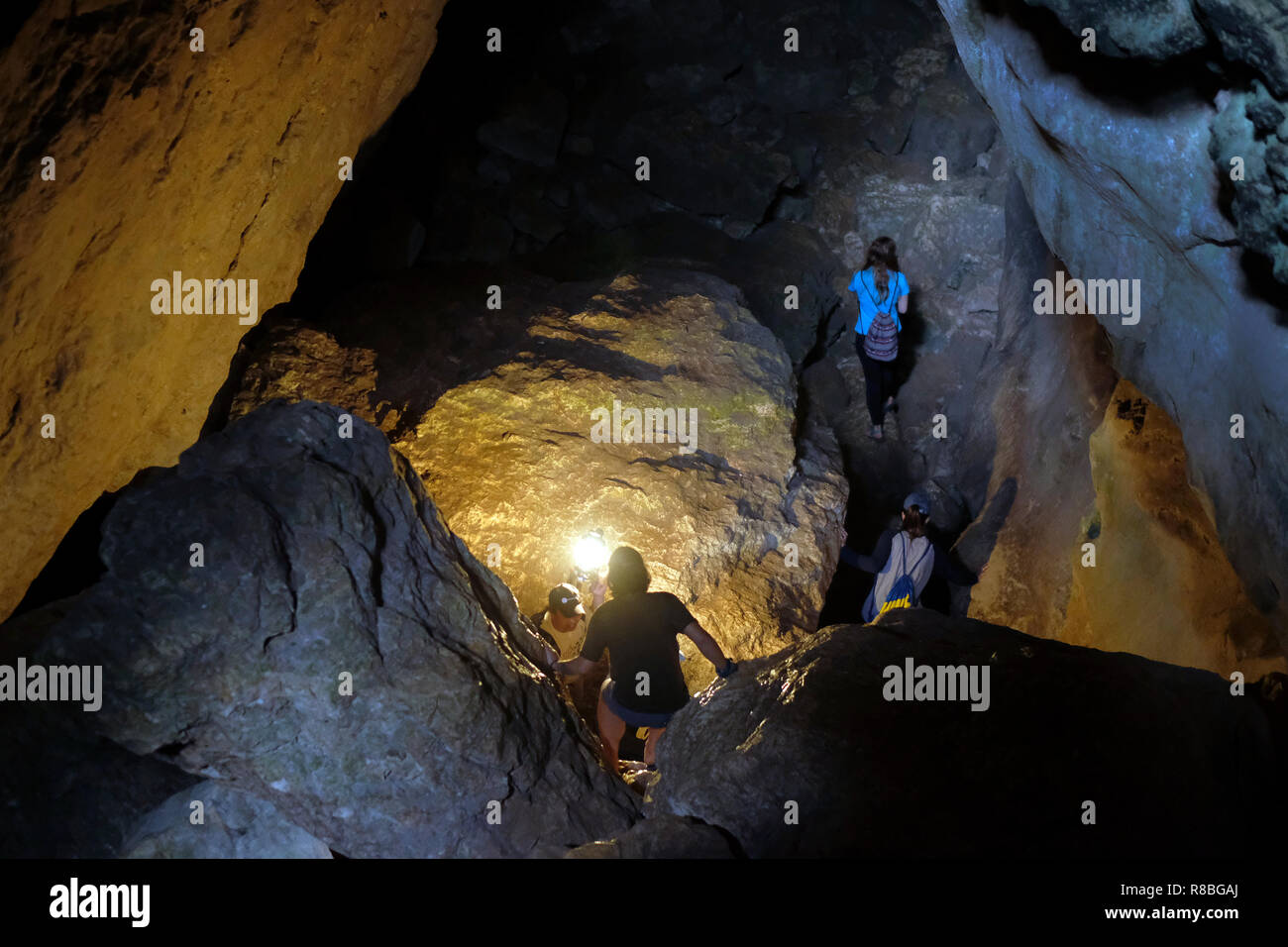 Hikers inside Lumiang Burial Cave located in Sagada in the Cordillera Mountains in Luzon Island ...