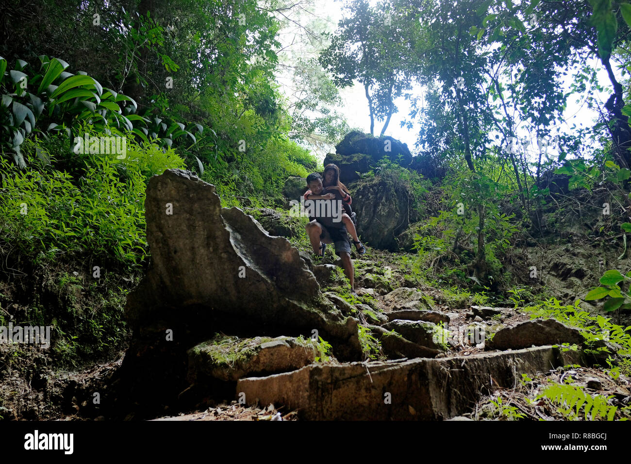 Hikers enter Lumiang Cave located in Sagada in the Cordillera Mountains ...