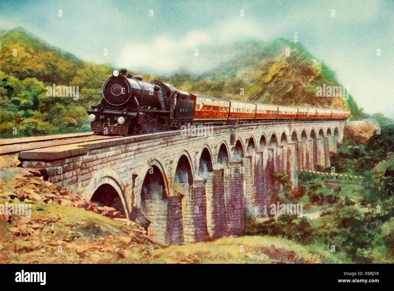 'Between Bombay and Delhi. A striking view of the Frontier Mail passing ...
