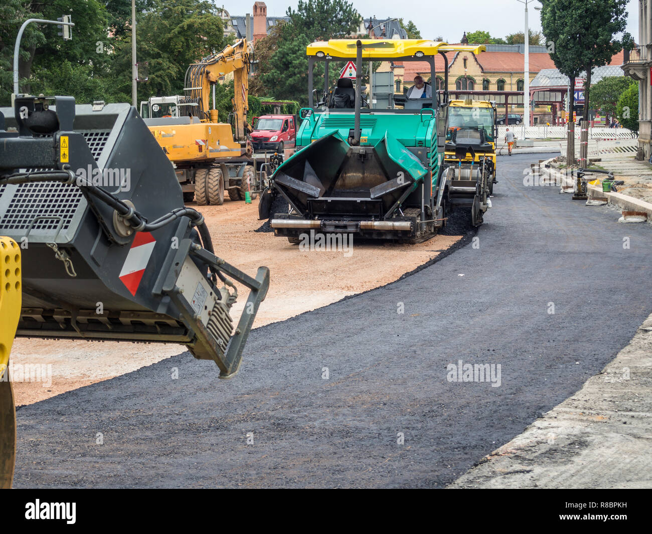Large construction site tar machine Stock Photo - Alamy