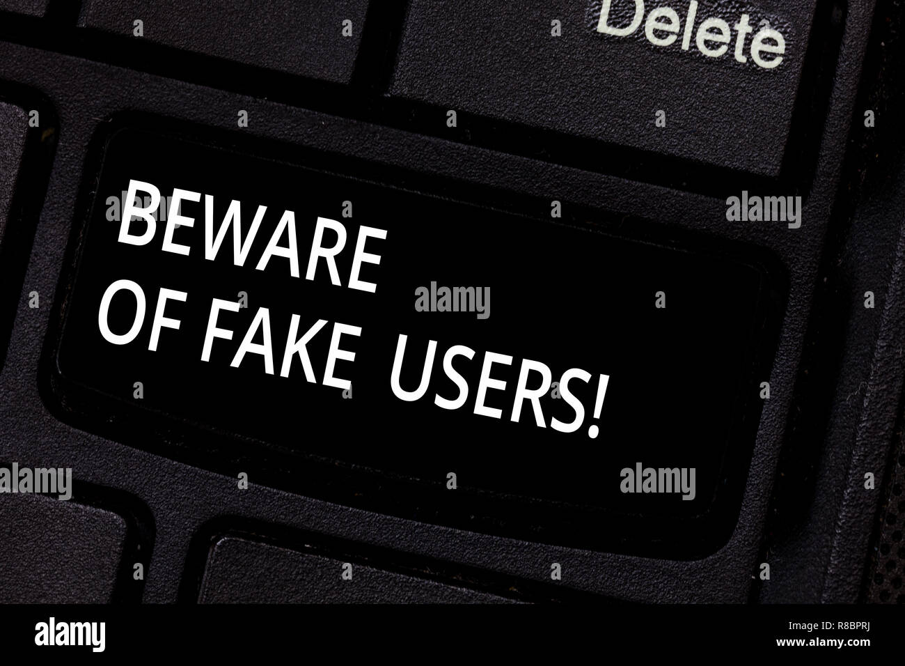 Handwriting text Beware Of Fake Users. Concept meaning Be aware of ...