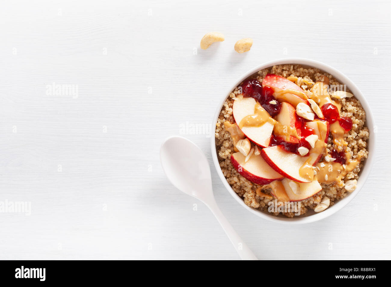 apple peanut butter quinoa bowl with jam and cashew for healthy ...