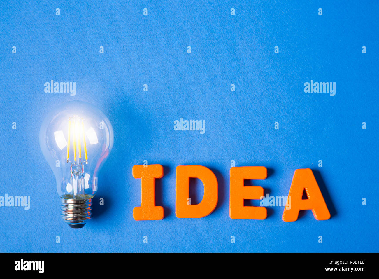 Light bulb glowing as Business idea concept with concept creative ...