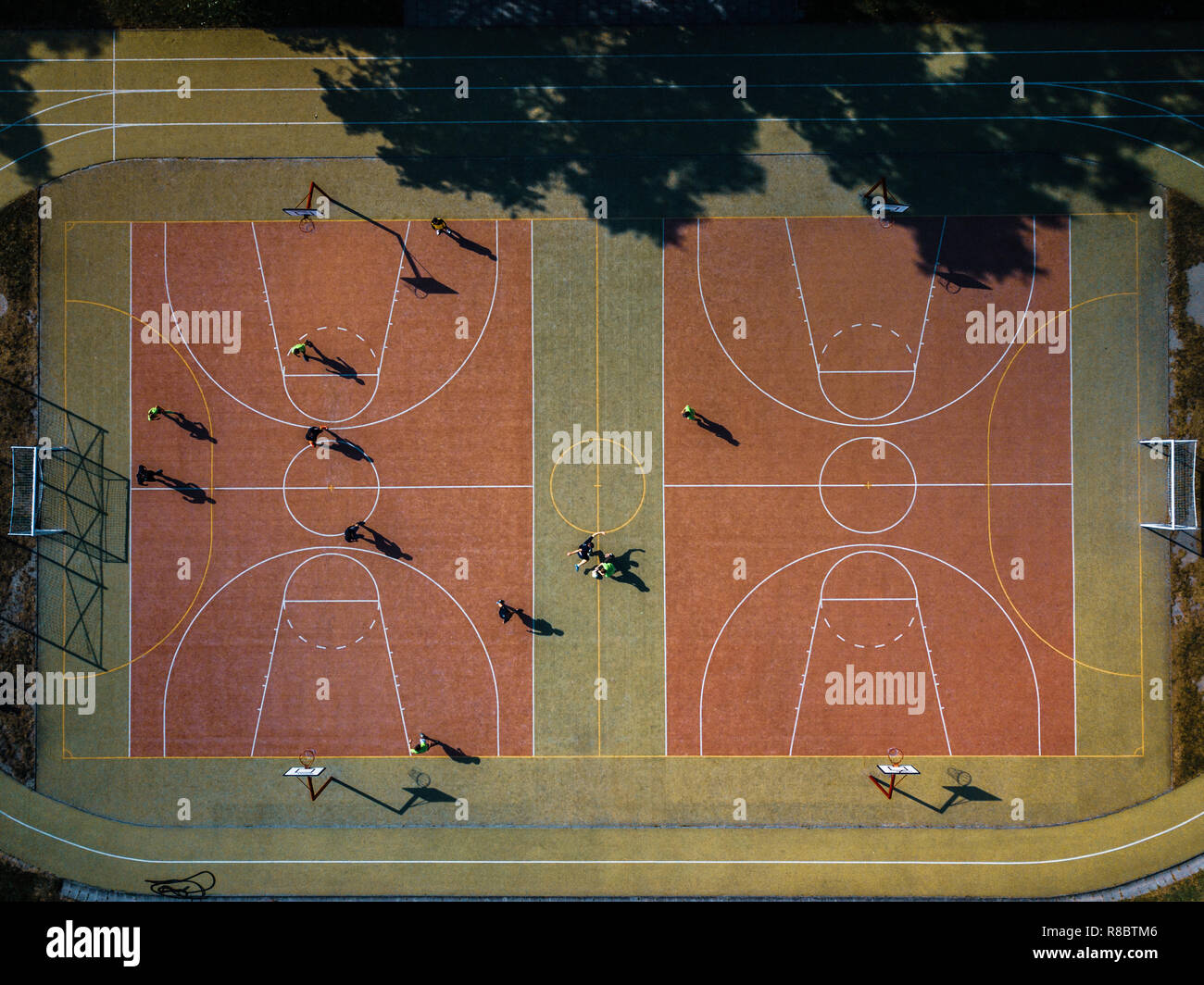 Aerial view of a soccer pitch with people playing soccer on it - in ...