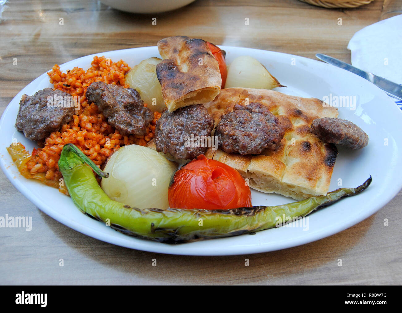 Grilled Turkish Meat Balls (Izgara Kofte), with bread, grilled tomatoes ...
