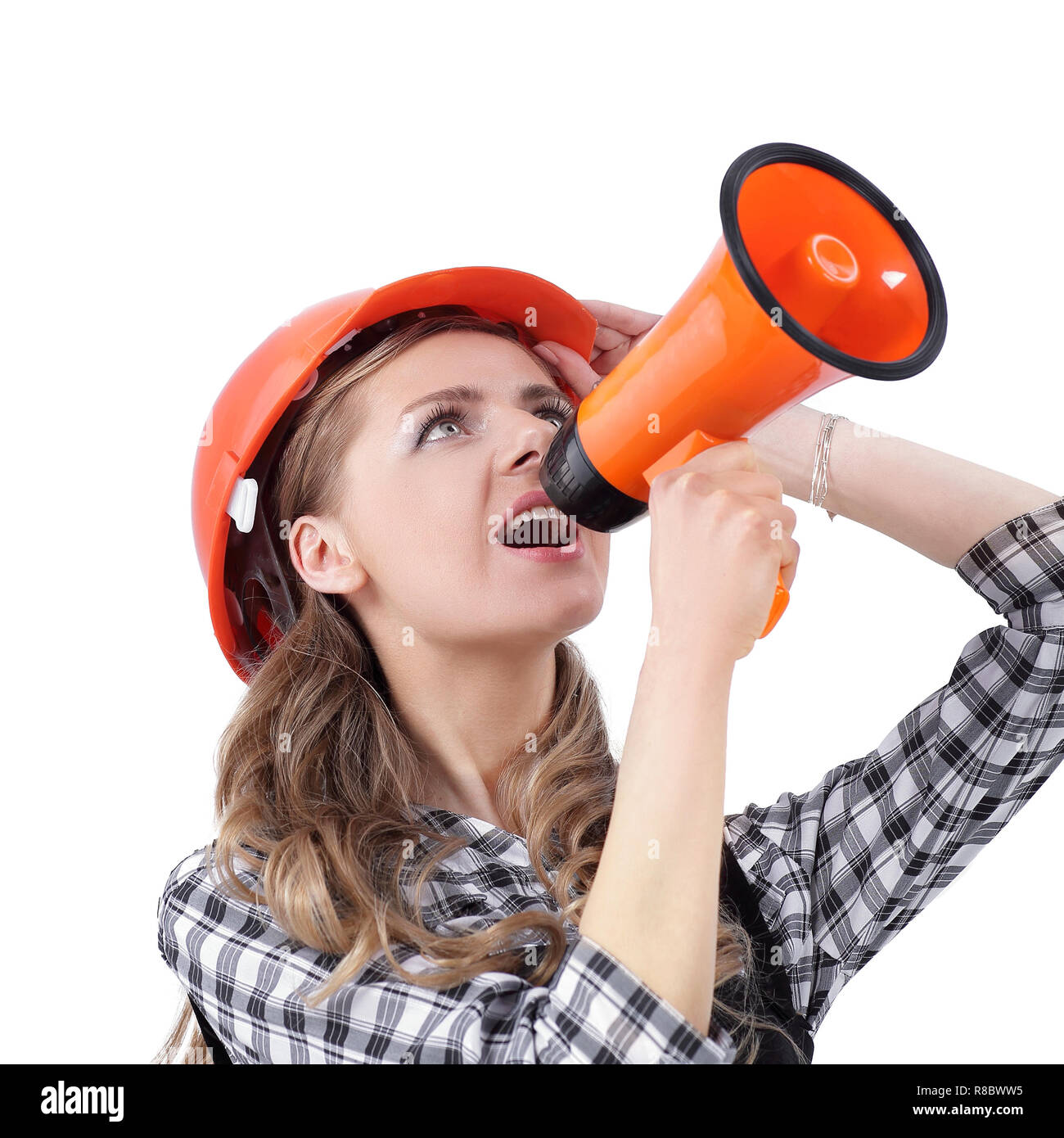 young woman engineer with a megaphone .isolated on white Stock Photo ...