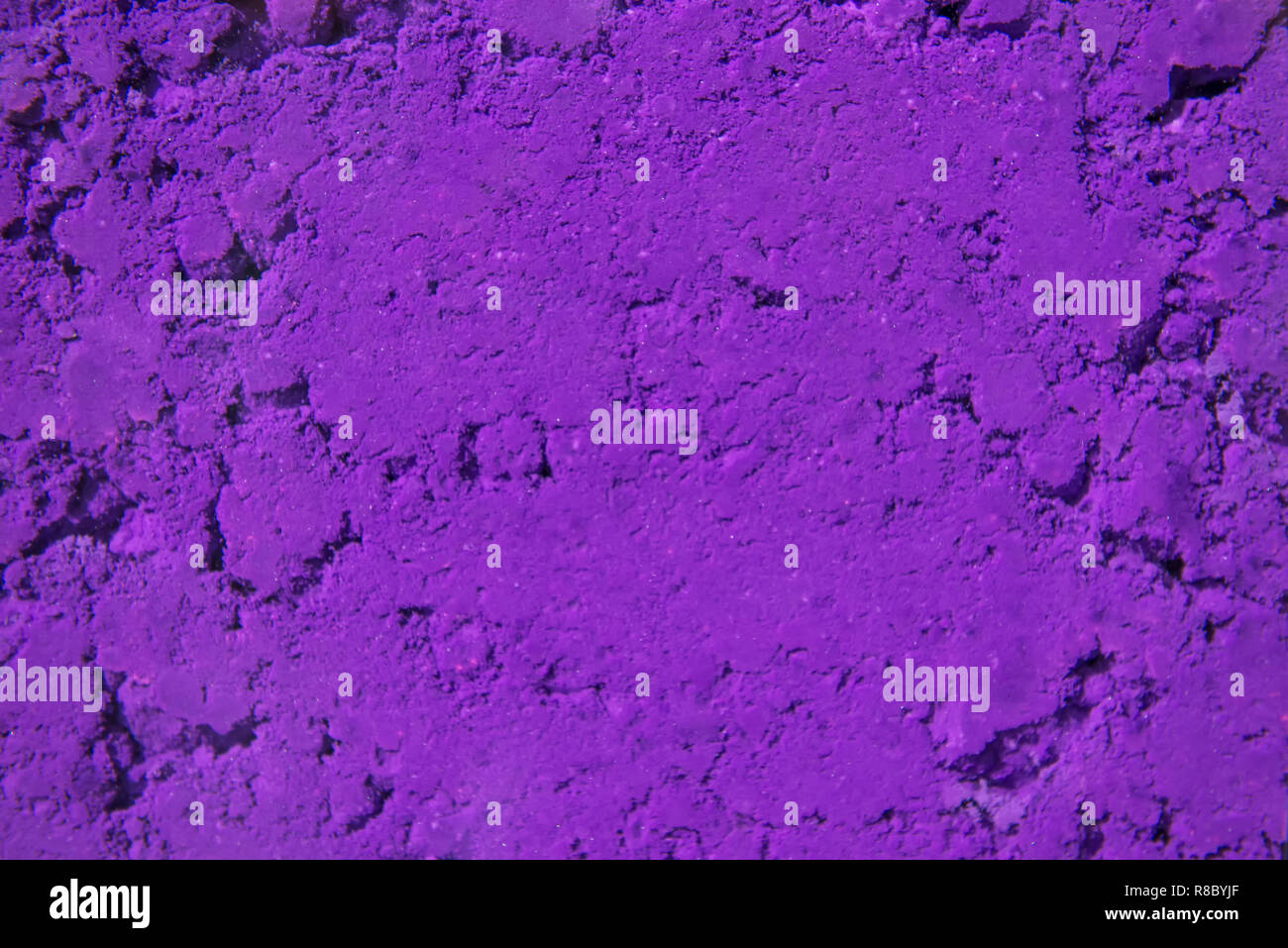 Violet, purple color powder background. Bright colours for Indian holi ...