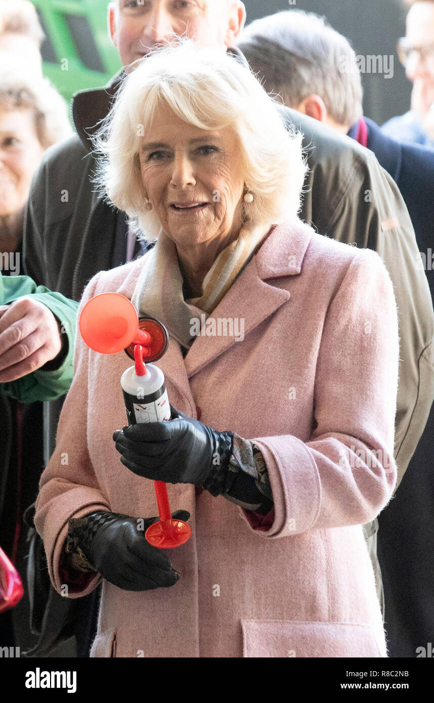 The Duchess of Cornwall uses an air horn to start a tractor rebuild by ...