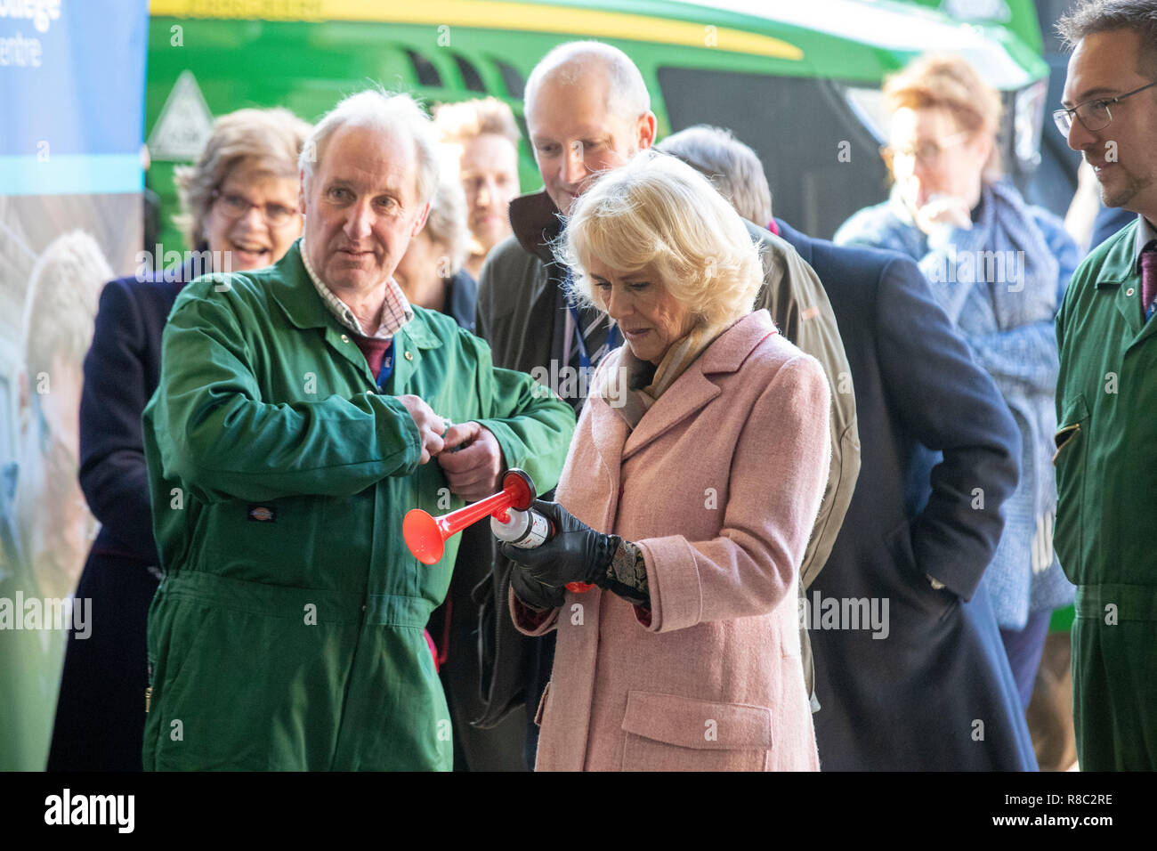 The Duchess of Cornwall uses an air horn to start a tractor rebuild by ...