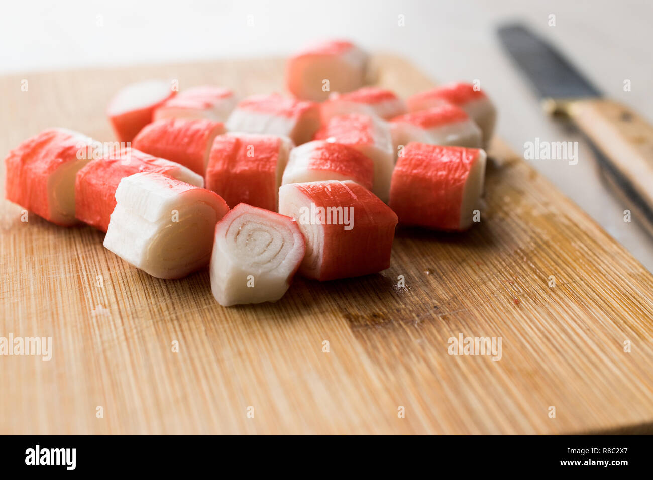 Fresh Sliced Crab Stick Slices Surimi on Wooden Board. Ready to Eat ...