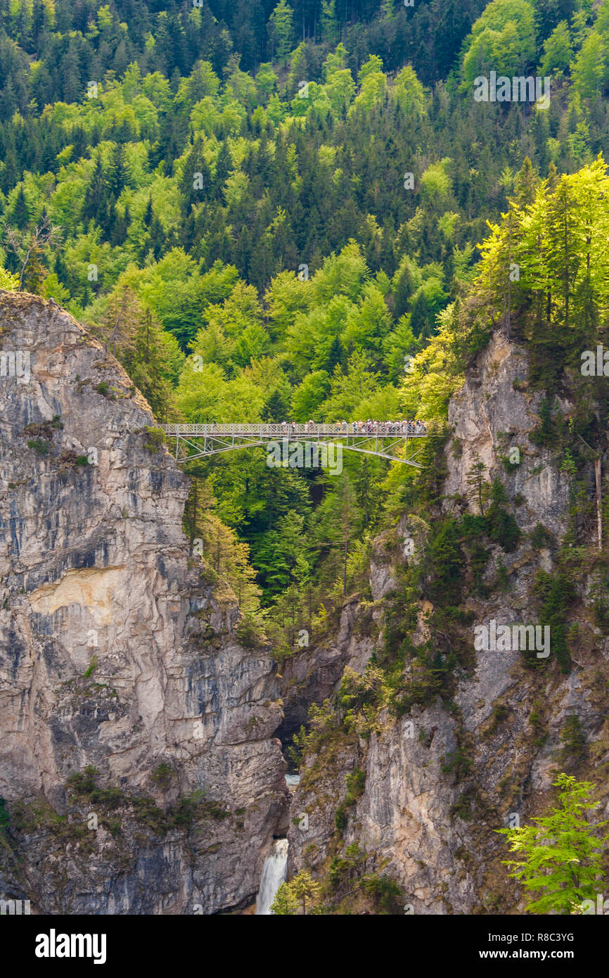 Great view of the narrow mountain ridge with tourists standing on the popular Queen Mary's ...