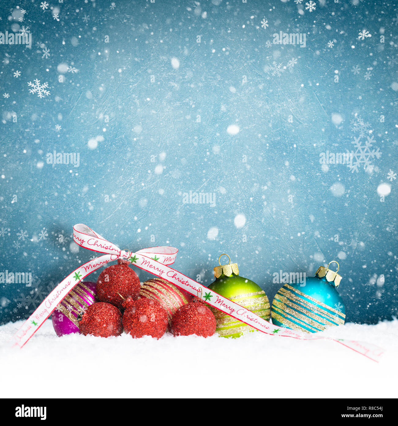 christmas ball in the snow Stock Photo - Alamy