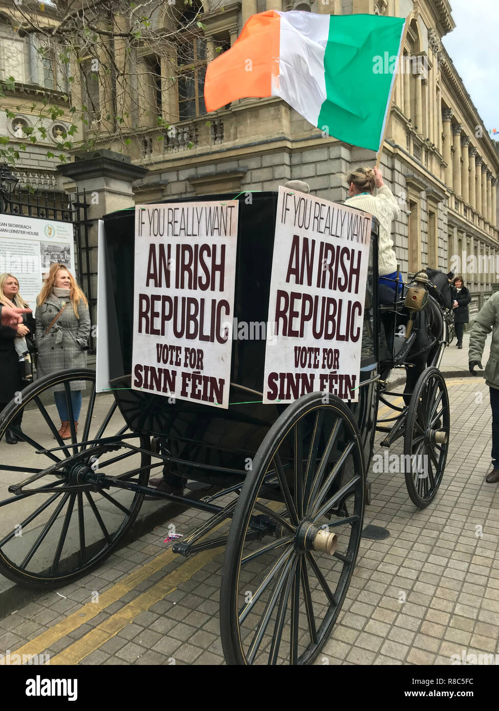 Sinn Fein recreates a 1918 photo outside the gates of Leinster House to ...