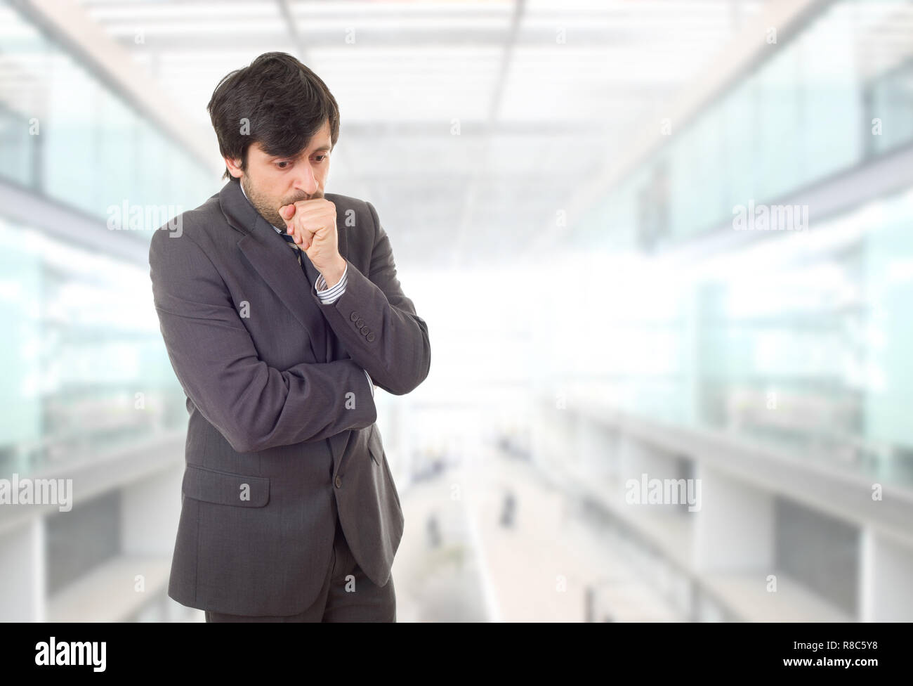 worried business man thinking at the office Stock Photo - Alamy
