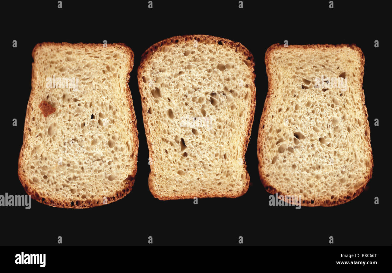 three bread slices in black Stock Photo - Alamy