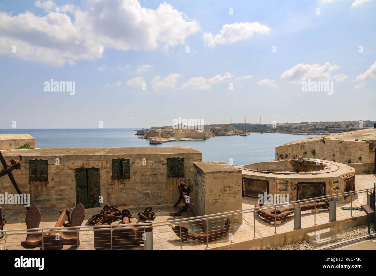 War museum and lighthouse at the harbour of Valletta, Malta Stock Photo ...