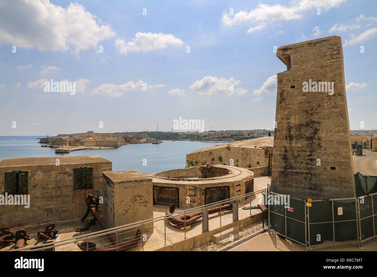 War museum and lighthouse at the harbour of Valletta, Malta Stock Photo ...