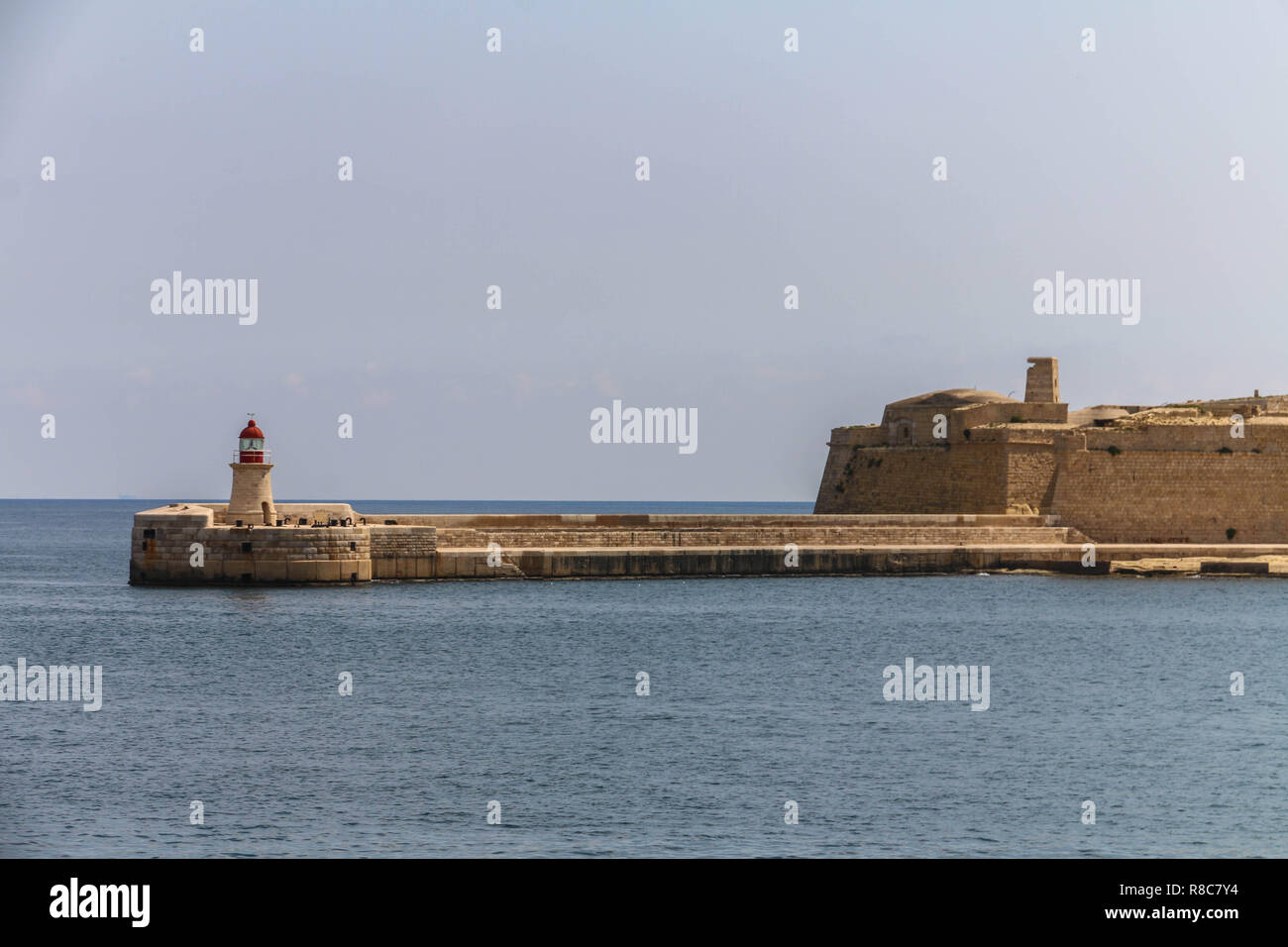 War museum and lighthouse at the harbour of Valletta, Malta Stock Photo ...