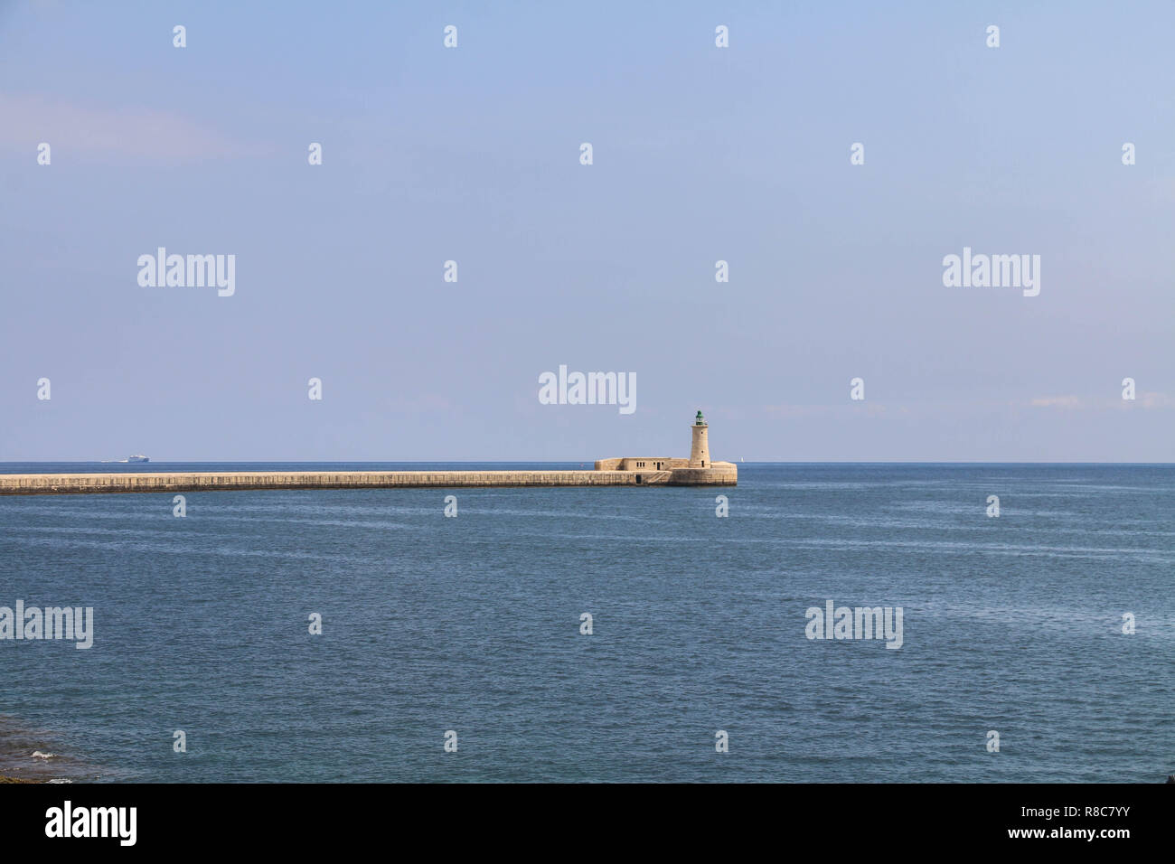 War museum and lighthouse at the harbour of Valletta, Malta Stock Photo ...
