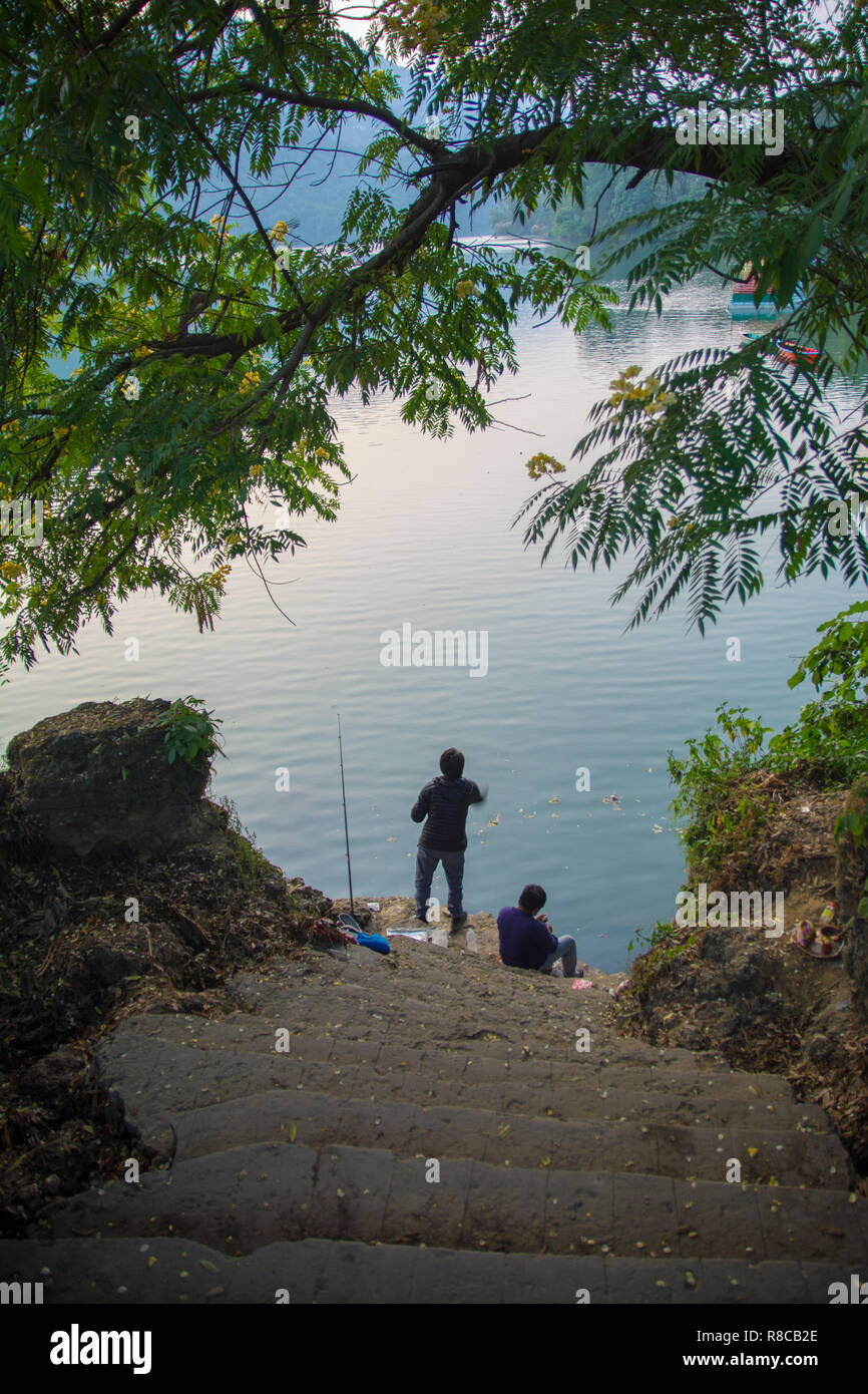 Fishing Around Phewa Lake and hills in Pokhara, a popular tourist ...