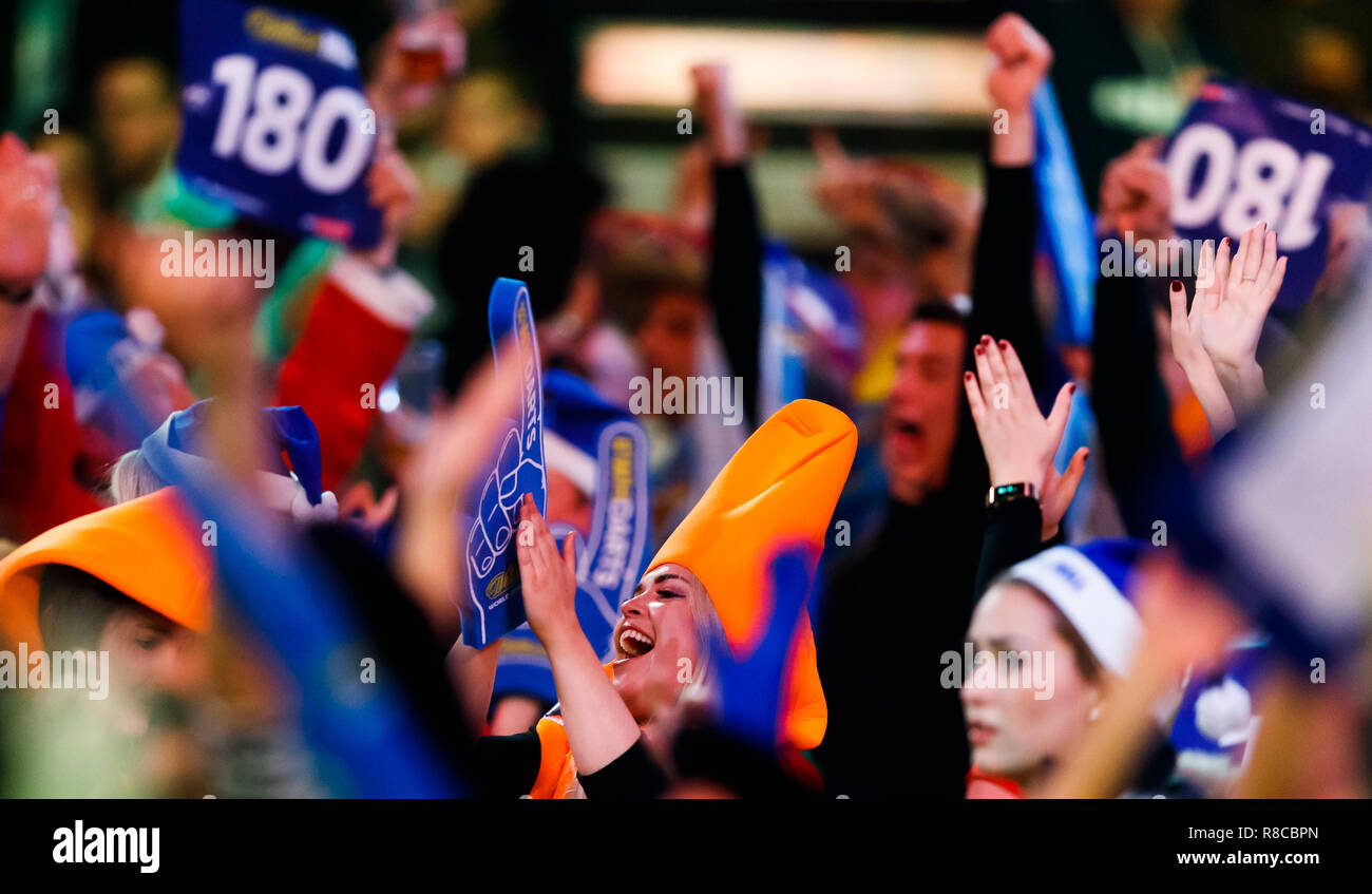 Darts fans celebrate during day two of the William Hill World Darts ...