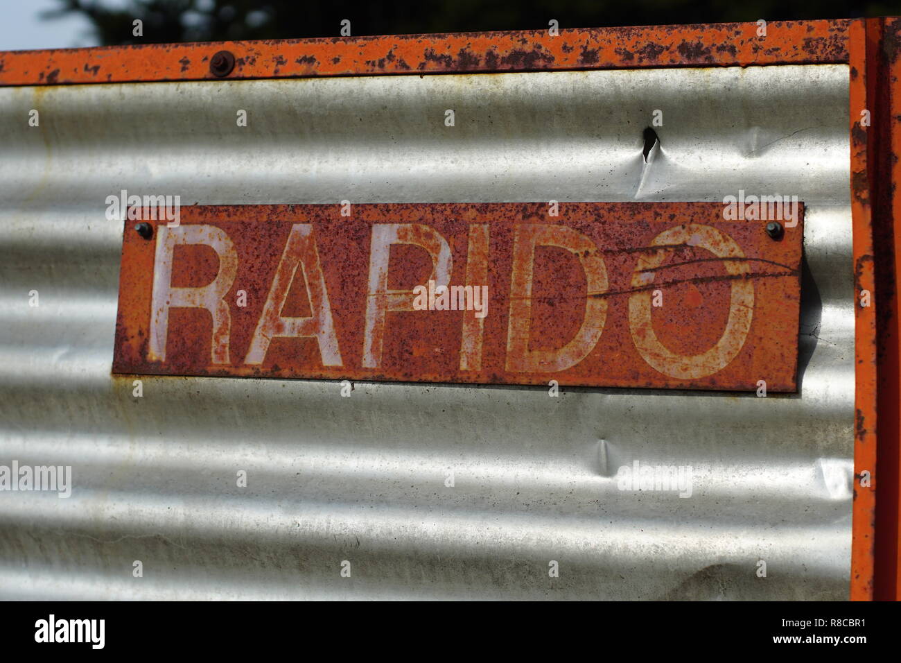old rusty sign on an old machine Stock Photo - Alamy