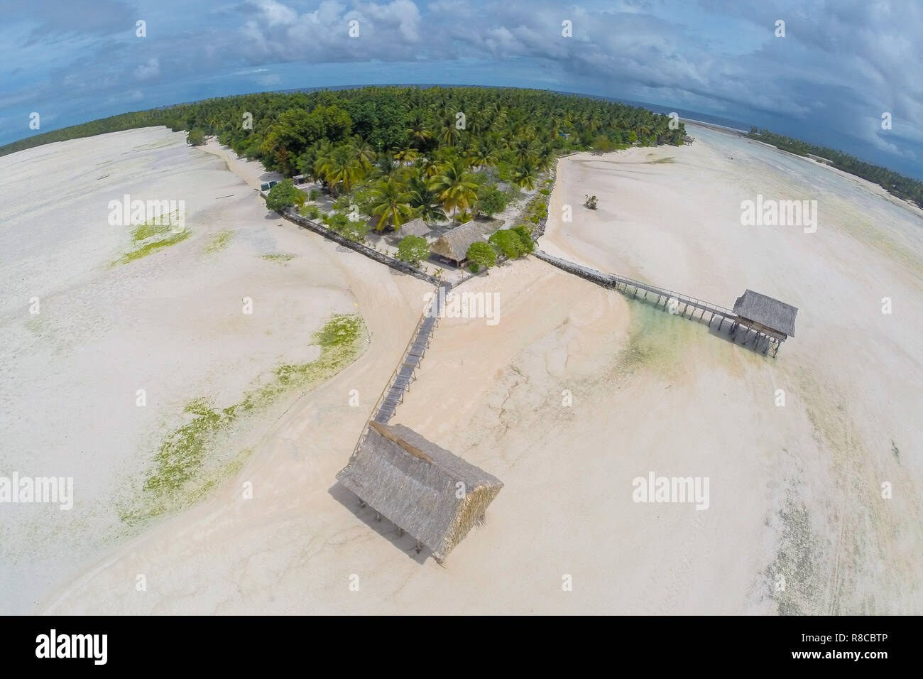 Traditional authentic over water thatched roof wooden bungalow of ...