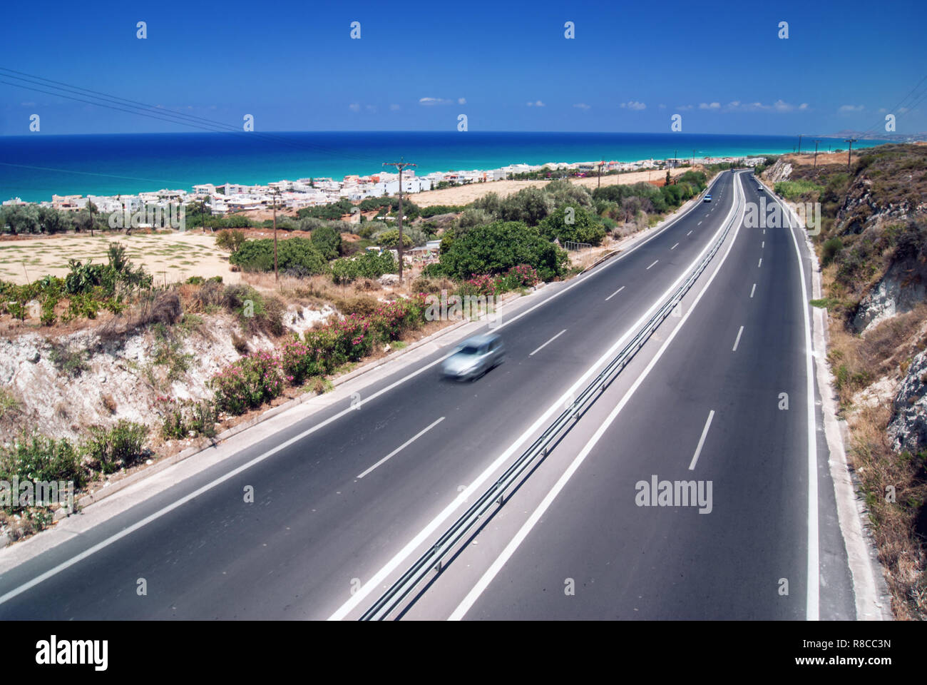 Highway in crete with beach and sea as background. Hoiday, summer ...