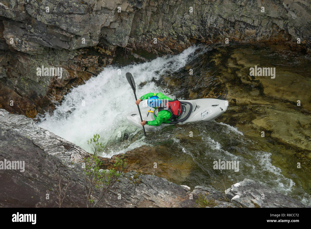 River kayaker in extreme drop in the Ula river outdoors in the ...